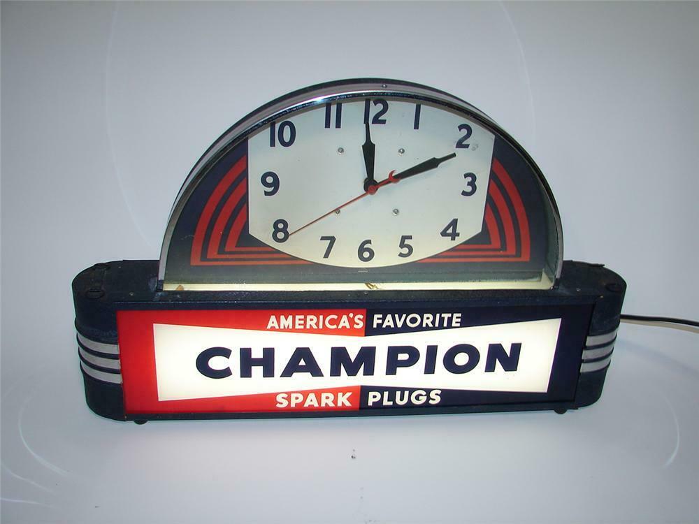 Gorgeous 1930s Champion Spark Plugs light-up garage clock.
