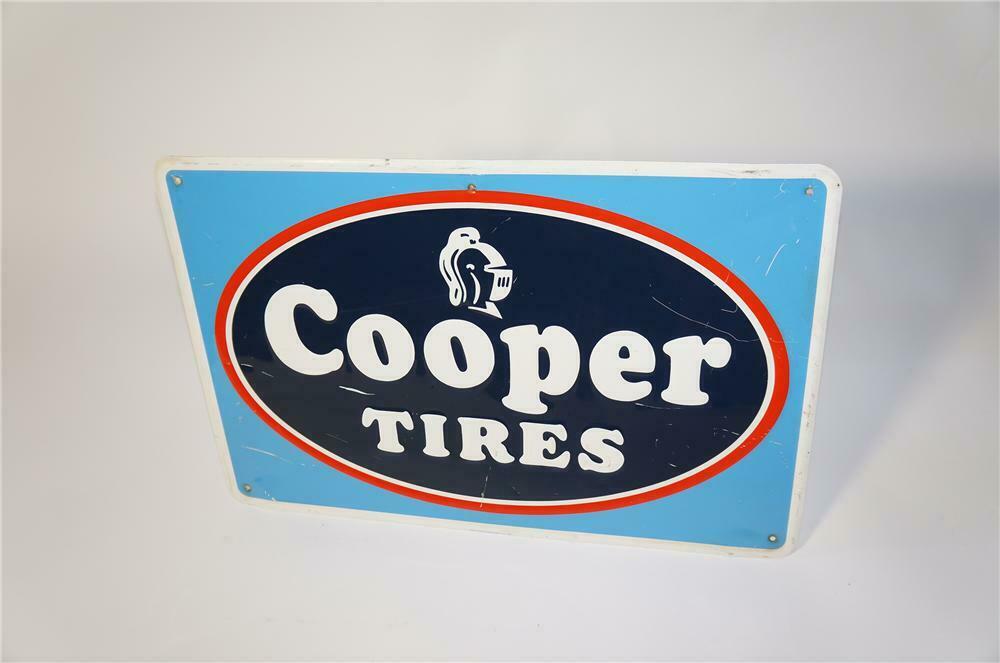 Nice 1960 Cooper Tires embossed tin automotive garage sign.