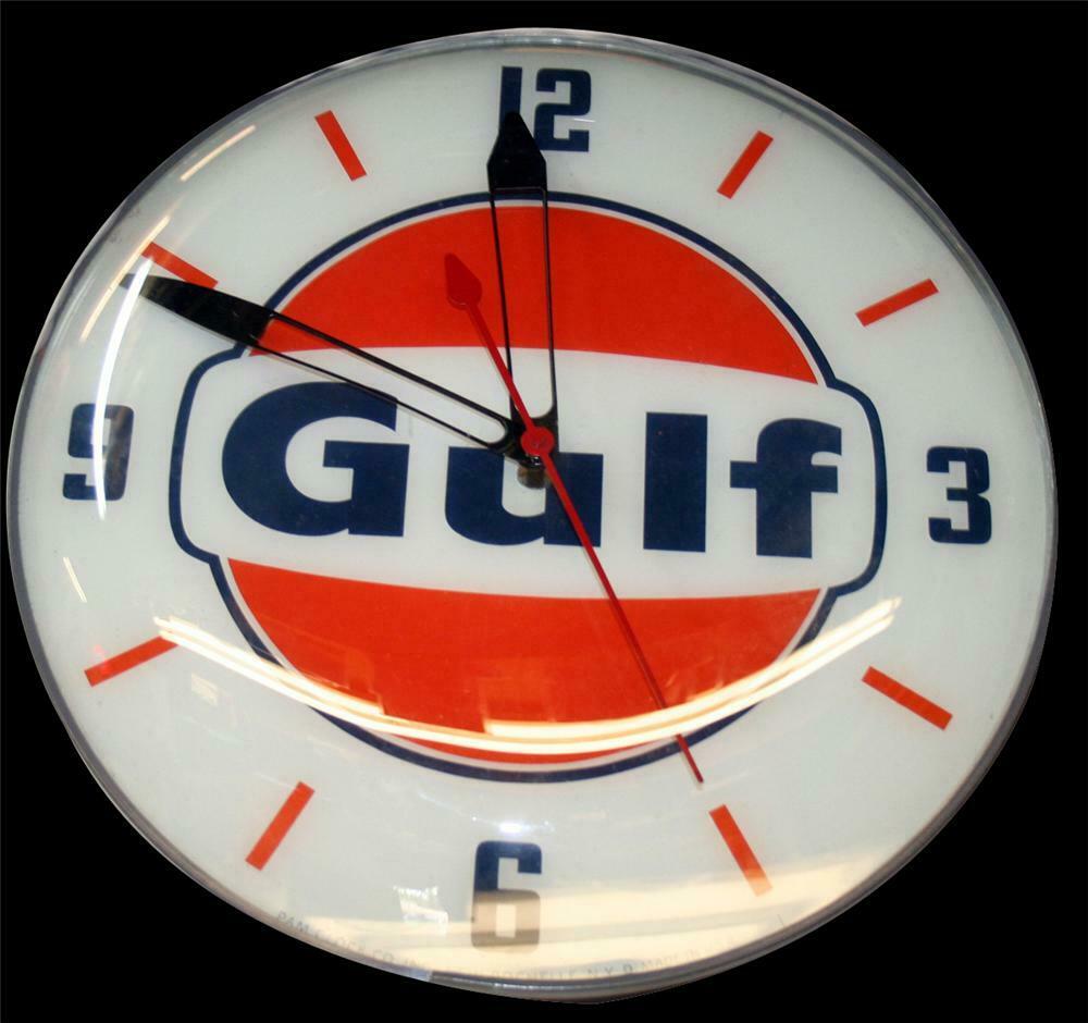 Nifty 1950s Gulf Oil glass faced light-up clock by Pam.