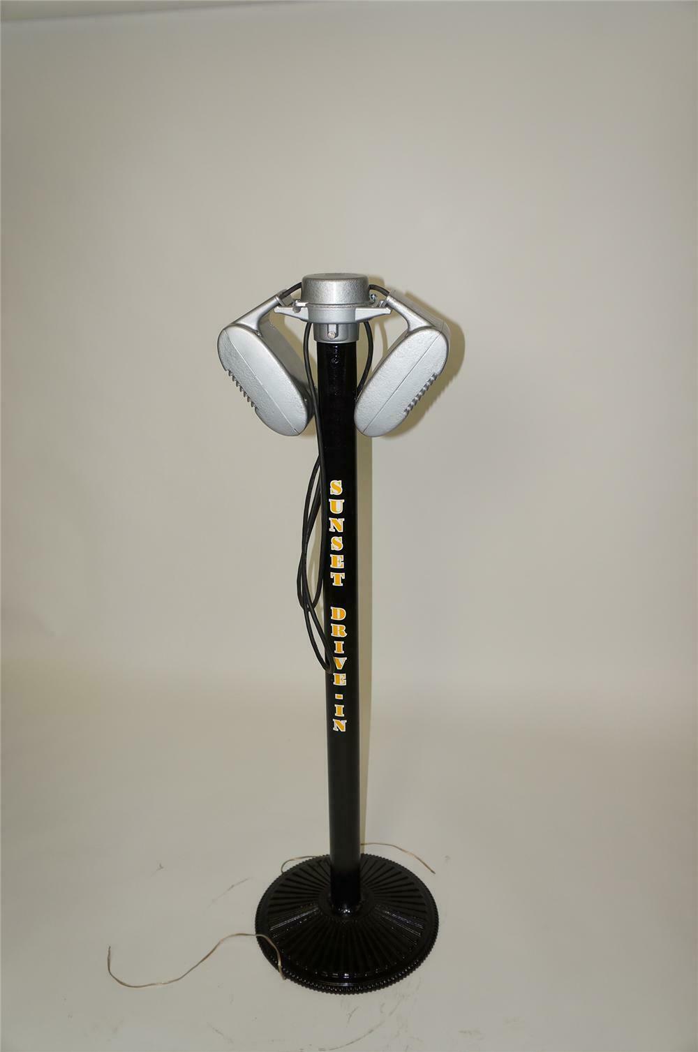 Nicely restored 1950s Sunset Drive-In Theater speakers on sta