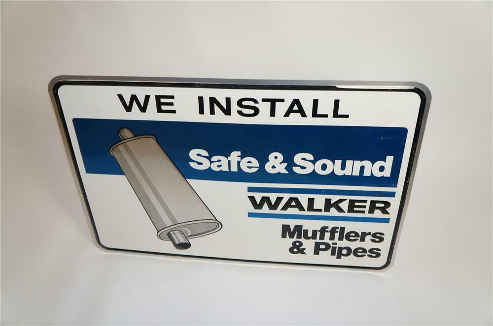 Large Walker Muffler embossed tin sign with nice graphics. F