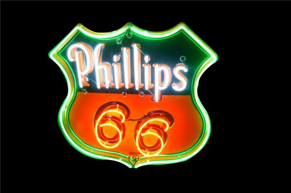 Stunning 1940's Phillips 66 shield shaped neon porcelain serv