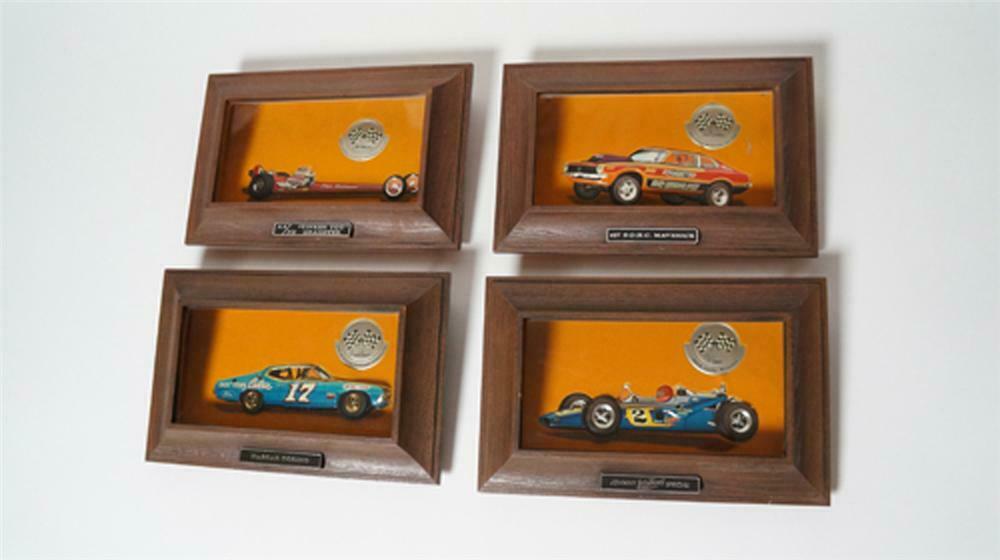 Killer 1970 set of four AutoLite dealership plaques featuring
