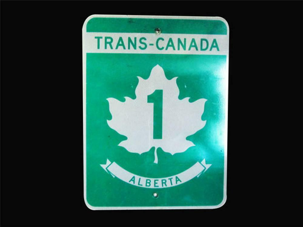 Trans-Canada Highway #1 metal road sign with Maple Leaf logo.