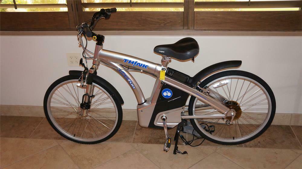Think electric powered bicycle with charger. - Front 3/4 - 179009