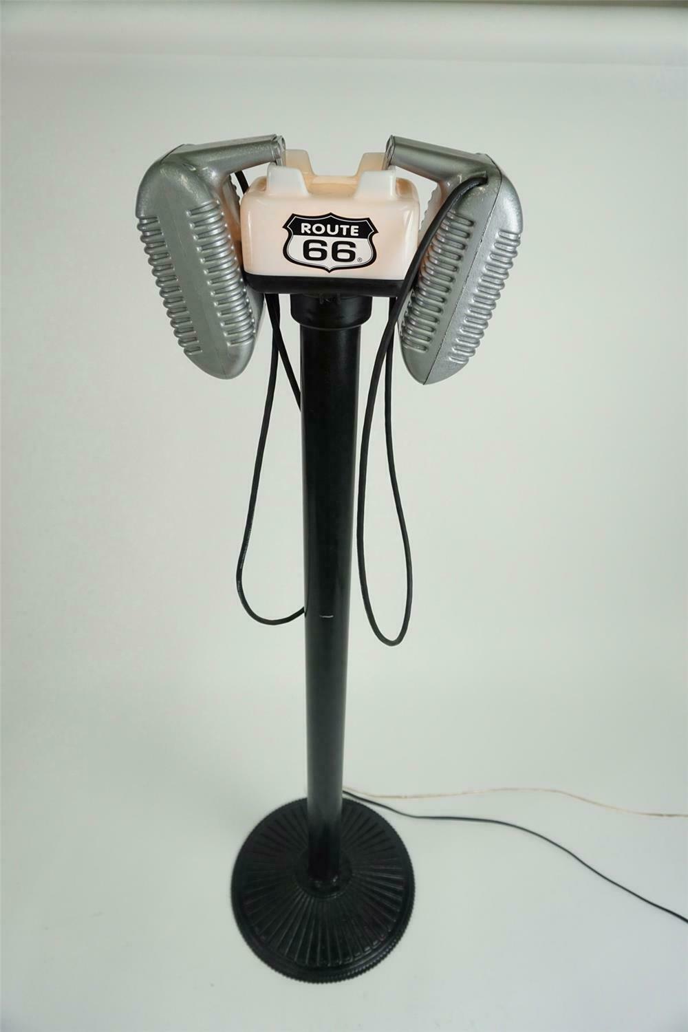 Neatly restored vintage Route 66 drive-in speakers with light