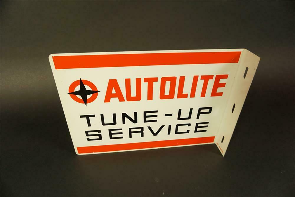 Unusual 1960s Ford Autolite tin dealership flange sign.