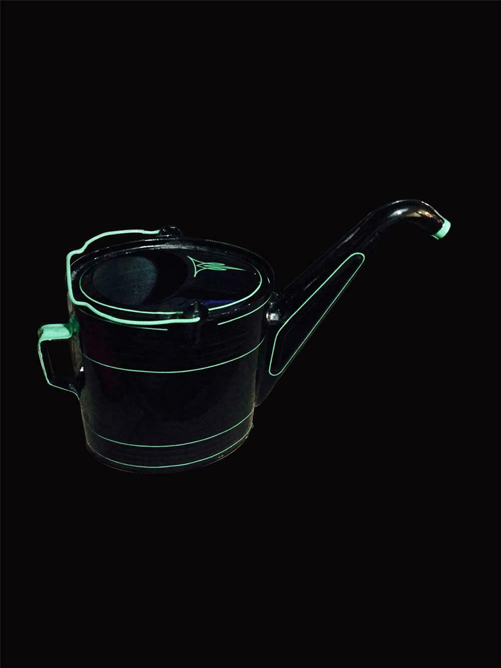 Vintage watering can nicely restored in Polly Gas regalia by