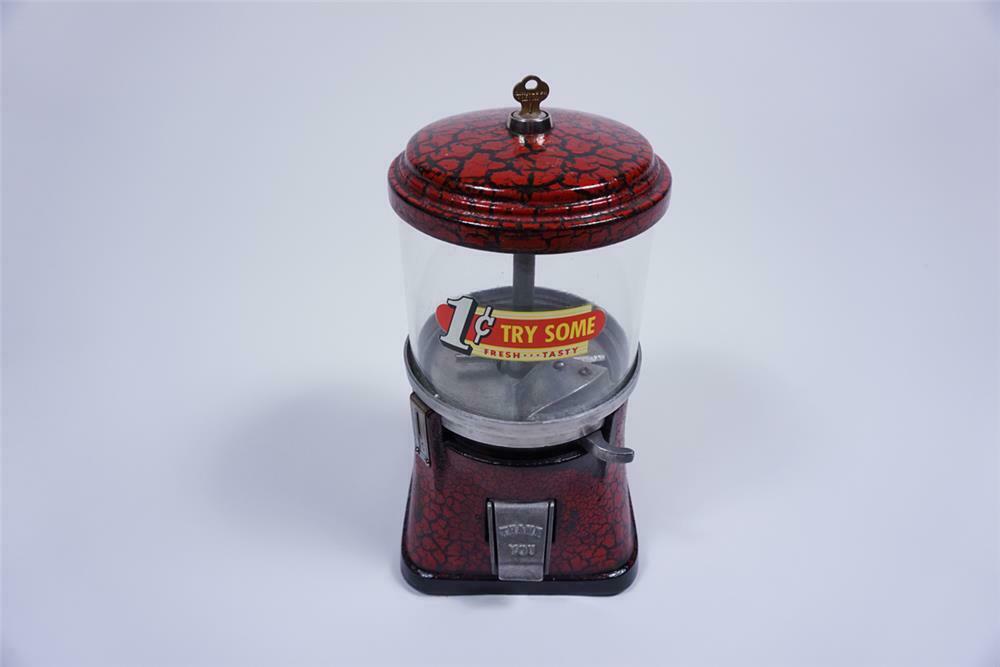 All original 1940s glass domed 1-cent peanut machine with ham