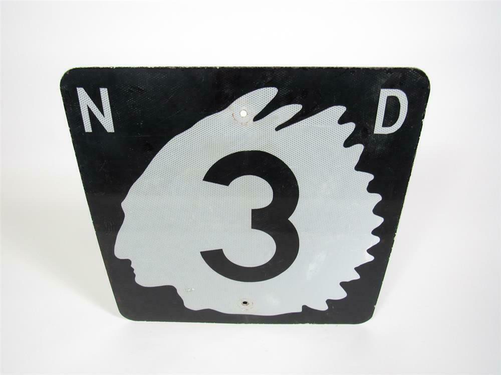 Vintage North Dakota Highway 3 metal road sign with Native Am