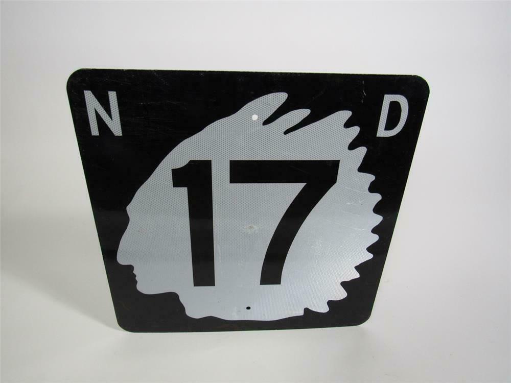 Vintage North Dakota Highway 17 metal road sign with Native A
