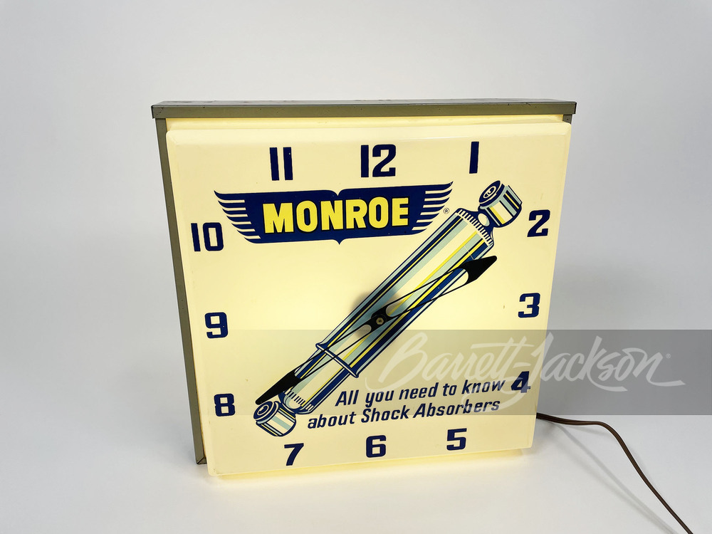 1960S MONROE SHOCK ABSORBERS LIGHT-UP CLOCK - Front 3/4 - 260809