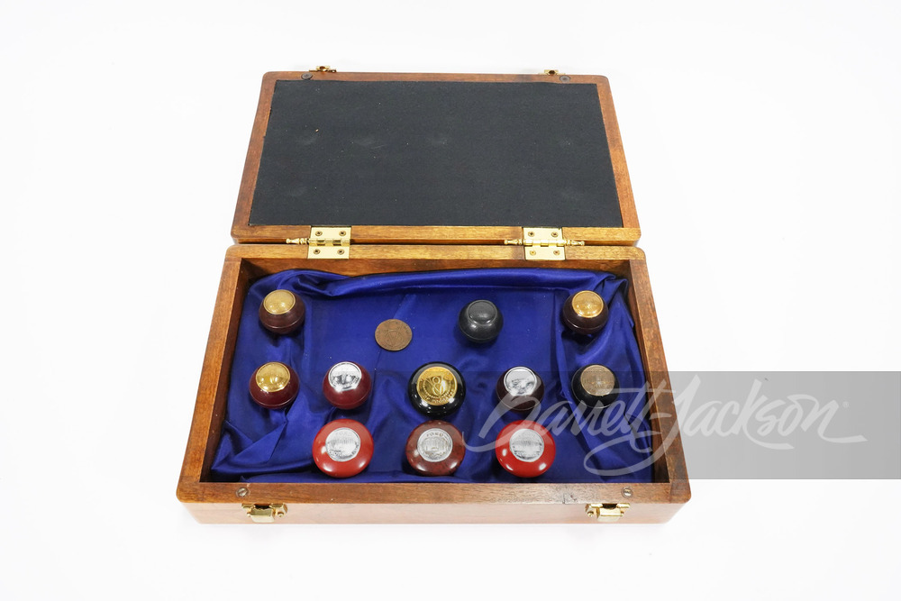 DISPLAY BOX OF 11 1934-35 FORD PROGRESS GEAR SHIFT COMMEMORAT