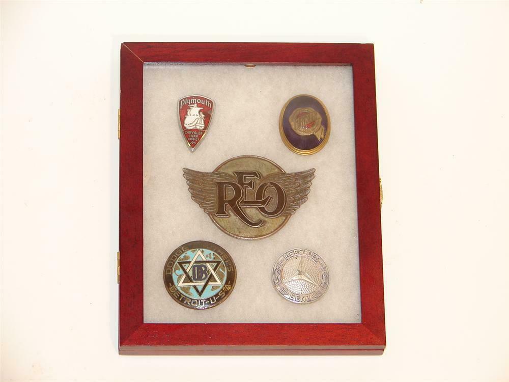 Set of five vintage enameled car badges circa 1920s-40s.