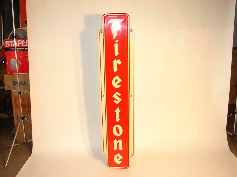 N.O.S. Firestone Tires verticle tin station sign.