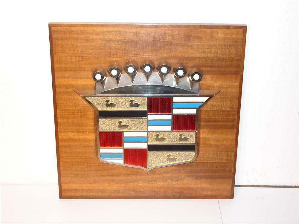 Distinctive 1960s Cadillac Automobiles Crest showroom sign.