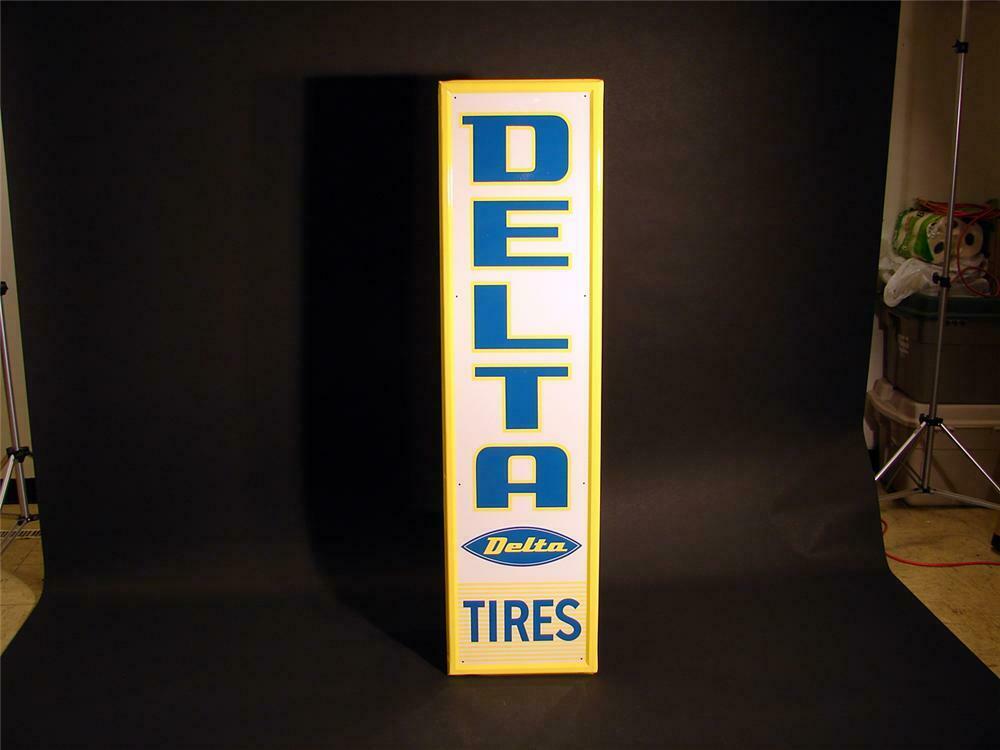 N.O.S. 1960s Delta Tires vertical tin painted garage sign.