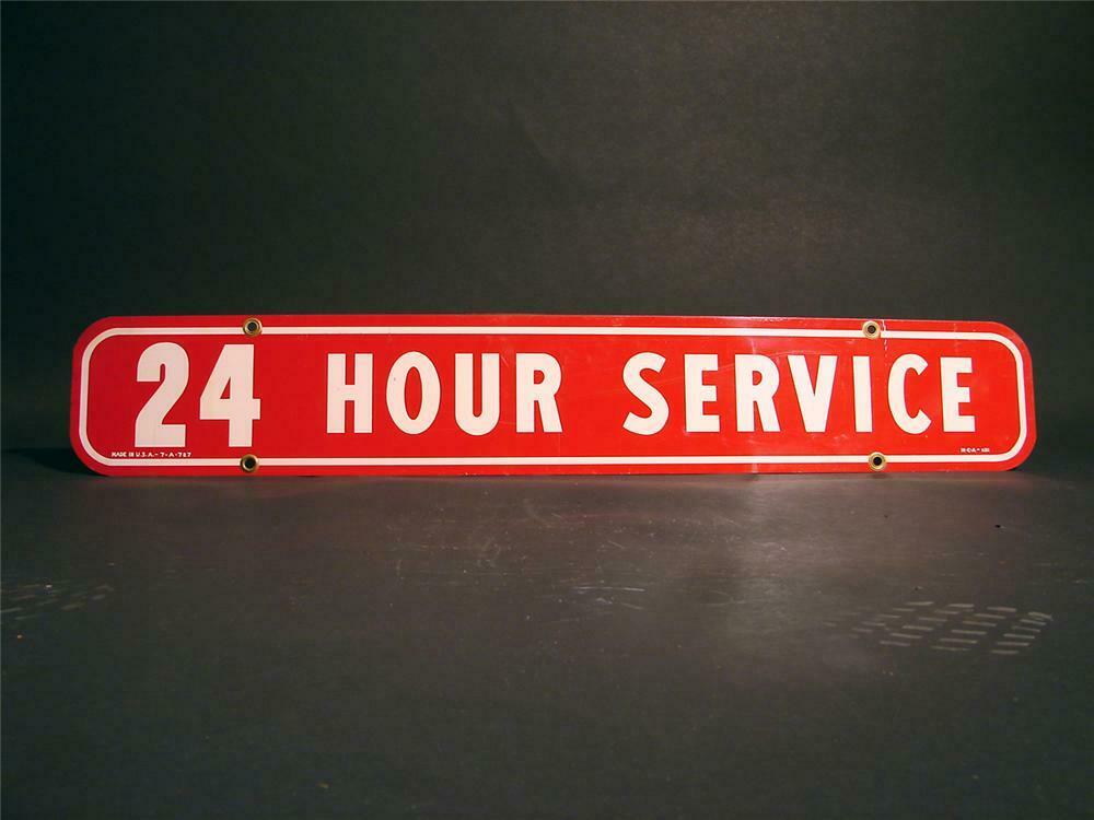 1960s Firestone '24 Hour Service' tin painted garage sign.