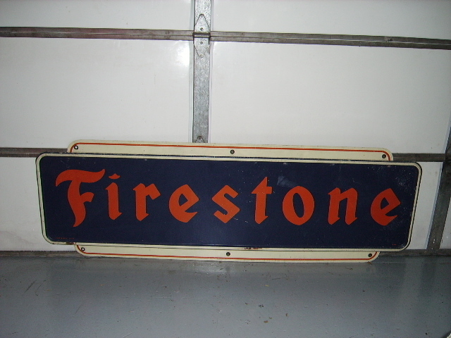 1950s Firestone Tires single-sided tin garage sign.