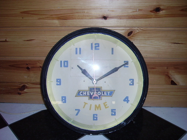 Hard to find 1930s-40s Chevrolet Time neon dealership clock.