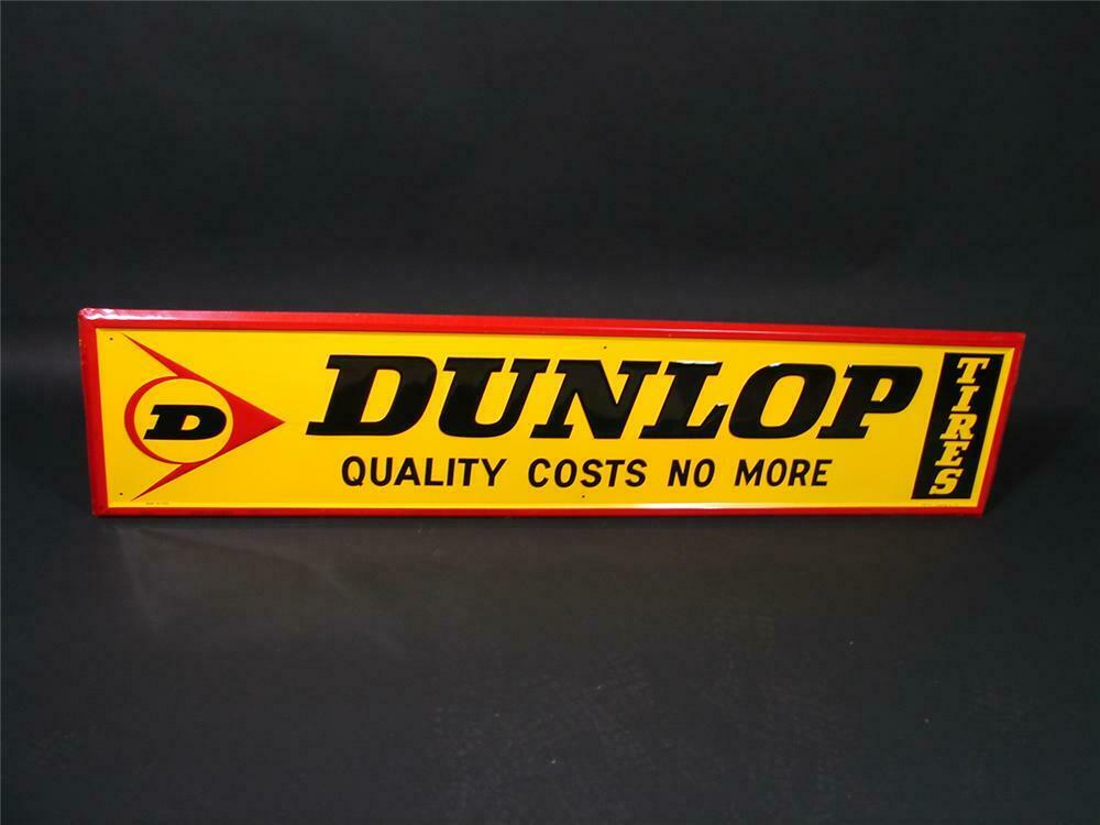 N.O.S. 1960s Dunlop Tires embossed tin horizontal garage sign