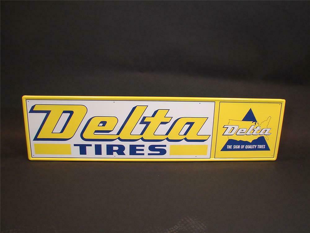 N.O.S. Delta Tires horizontal tin self-framed garage sign.