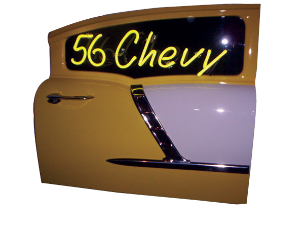 Authentic 1956 Chevrolet door panel restored into a piece of
