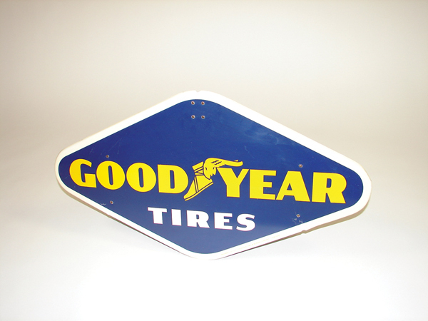 1950s Goodyear Tires single-sided tin garage sign. Condition: