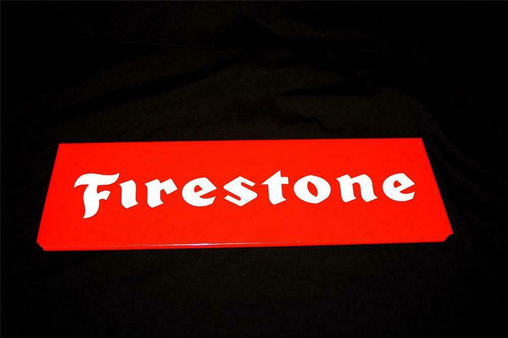 1960s Firestone Tires metal tire display sign.