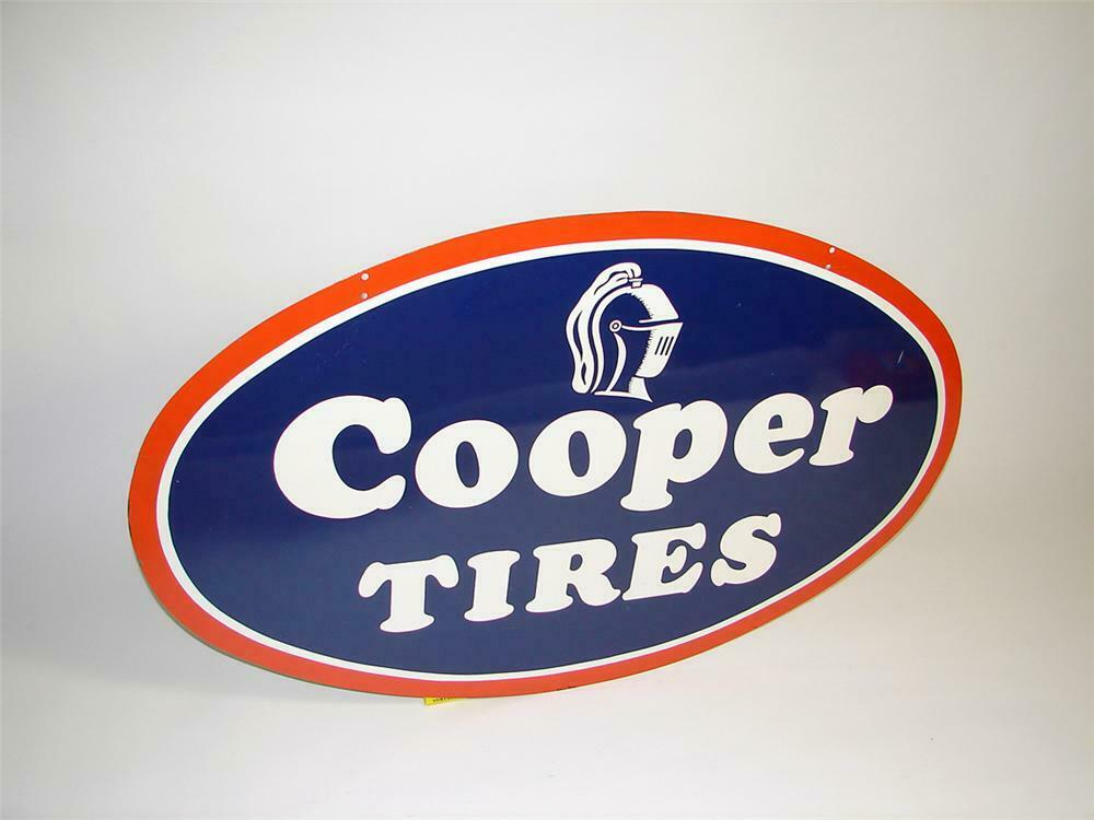 N.O.S. 1950s Cooper Tires double-sided tin garage sign.